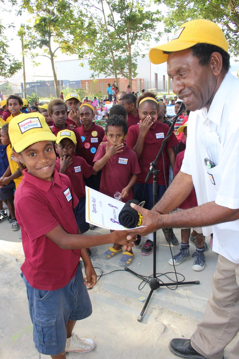 Principal Charlie Morrison awards Goodwill Student with encouragement ...